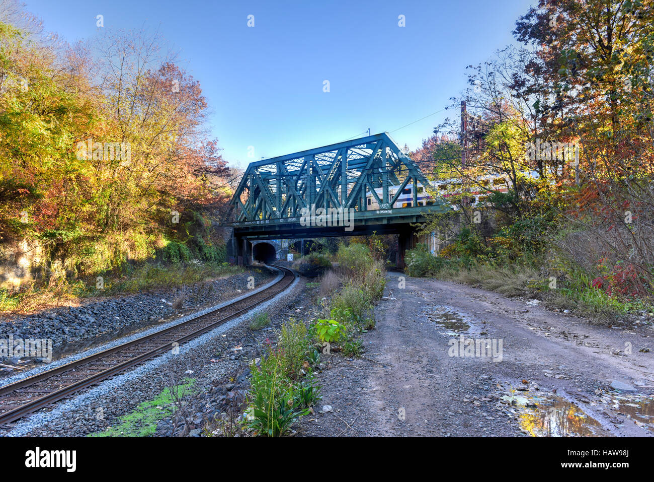 Train passing over bridge in Jersey City, New Jersey Stock Photo - Alamy