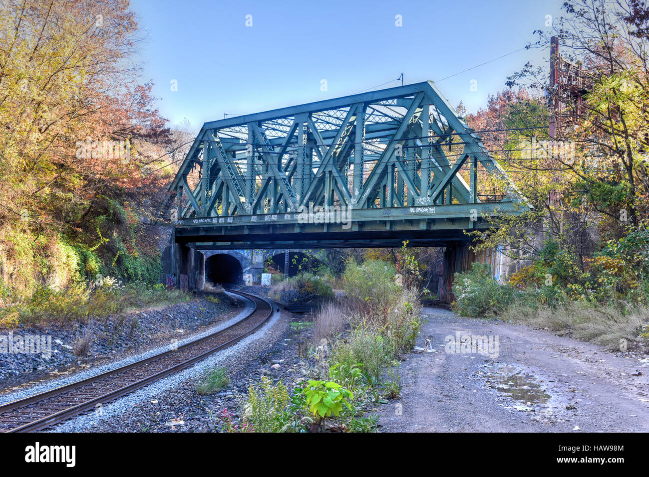 Train tracks going through the Bergen Arches of Jersey City, New Jersey ...