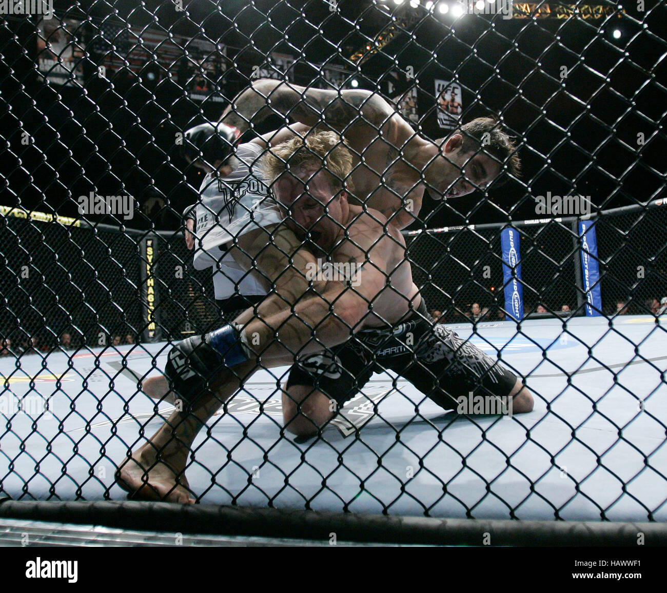 Kendall Grove, top, fights Jake Rosholt at UFC 106 at the Mandalay ...