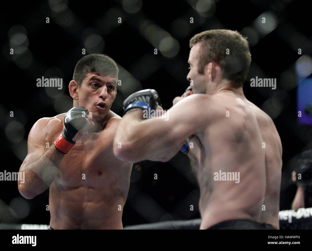 Paulo Thiago, left, fights Jacob Volkmann at UFC 106 at the Mandalay ...