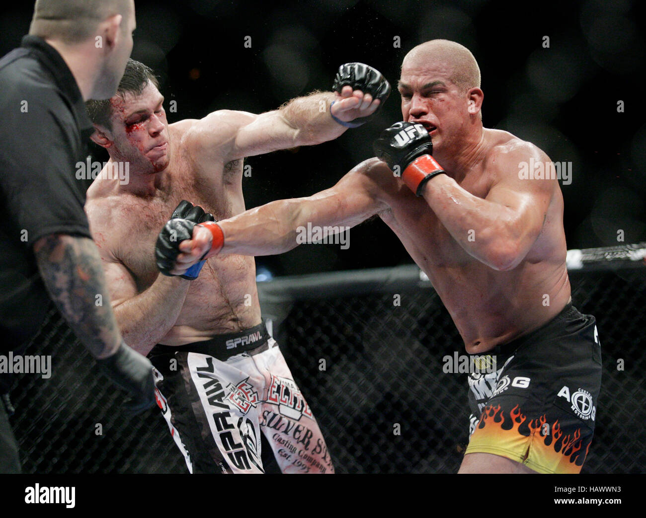 Forrest Griffin, left, fights Tito Ortiz at UFC 106 at the Mandalay ...