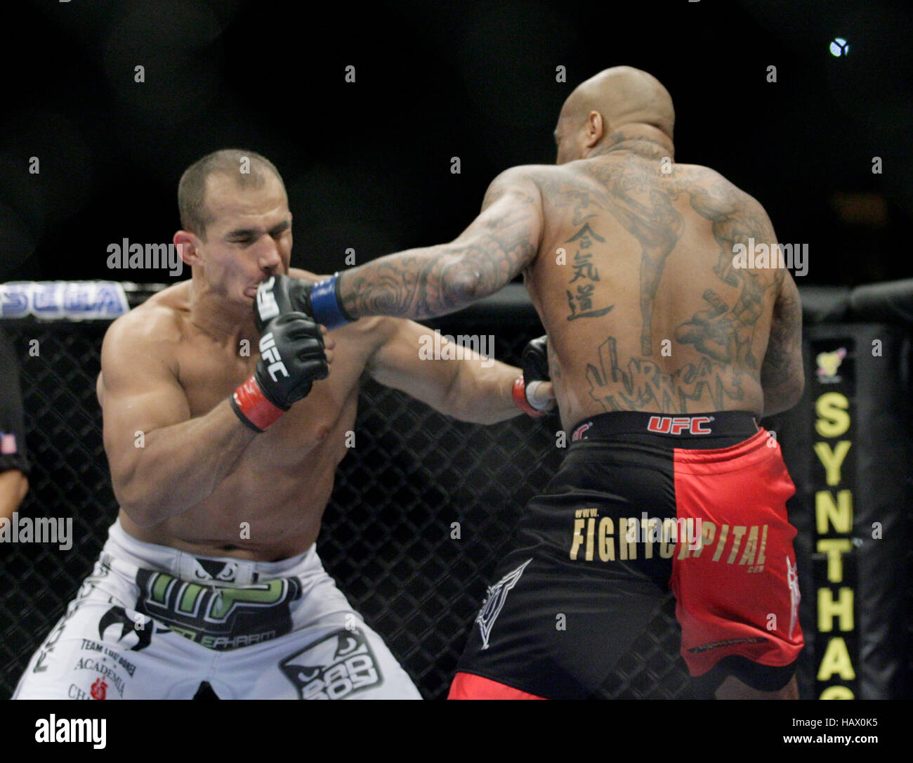 Junior dos Santos, left, fights Gilbert Yvel during UFC 108 at the MGM ...