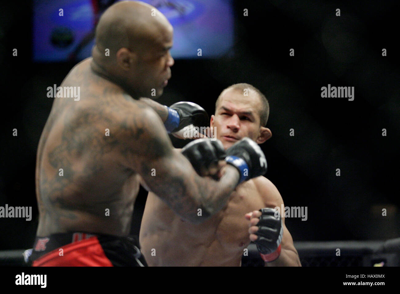 Junior dos Santos, right, fights Gilbert Yvel during UFC 108 at the MGM ...