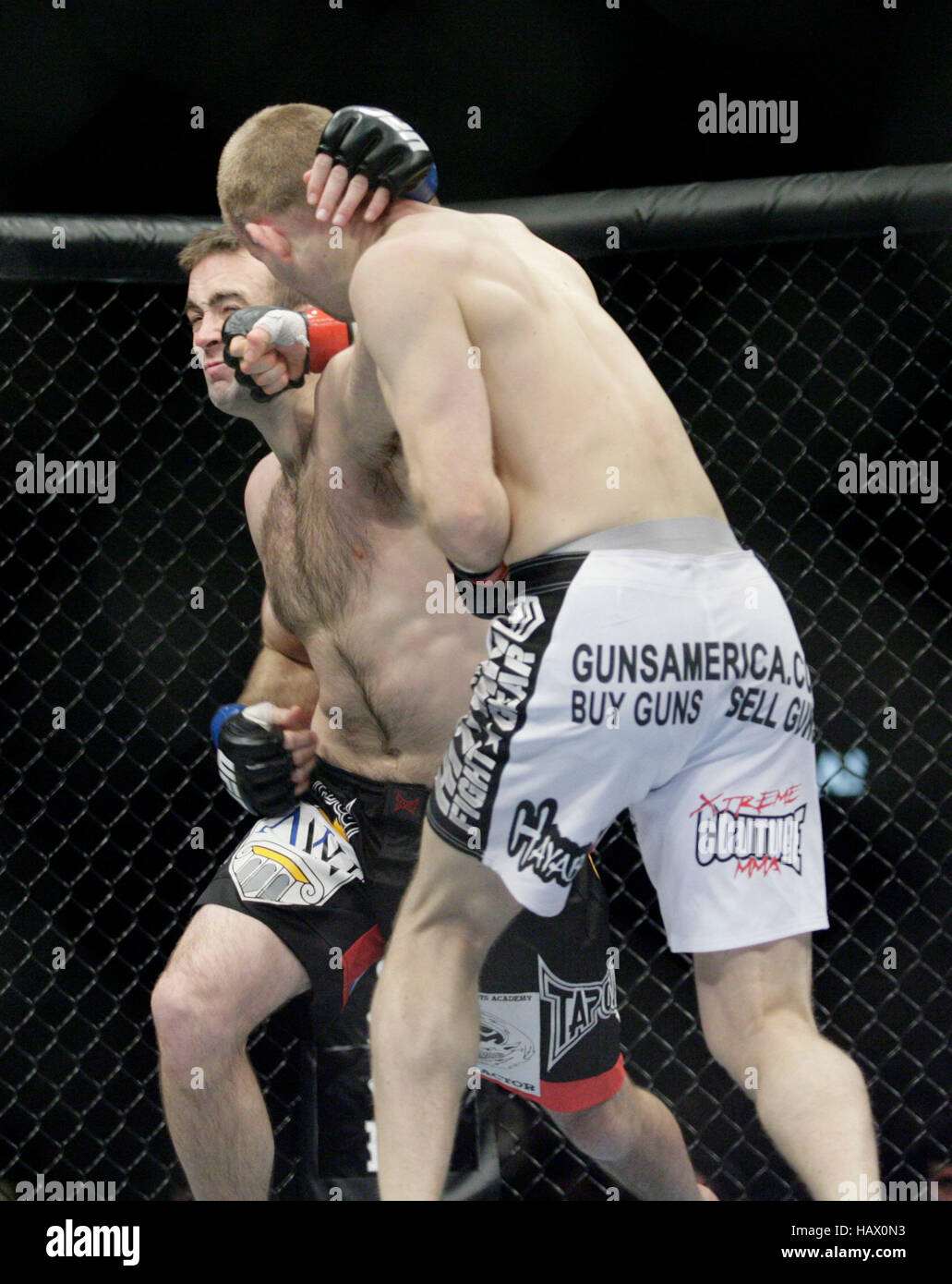 Martin Kampmann, right, fights Jacob Volkmann during UFC 108 at the MGM ...