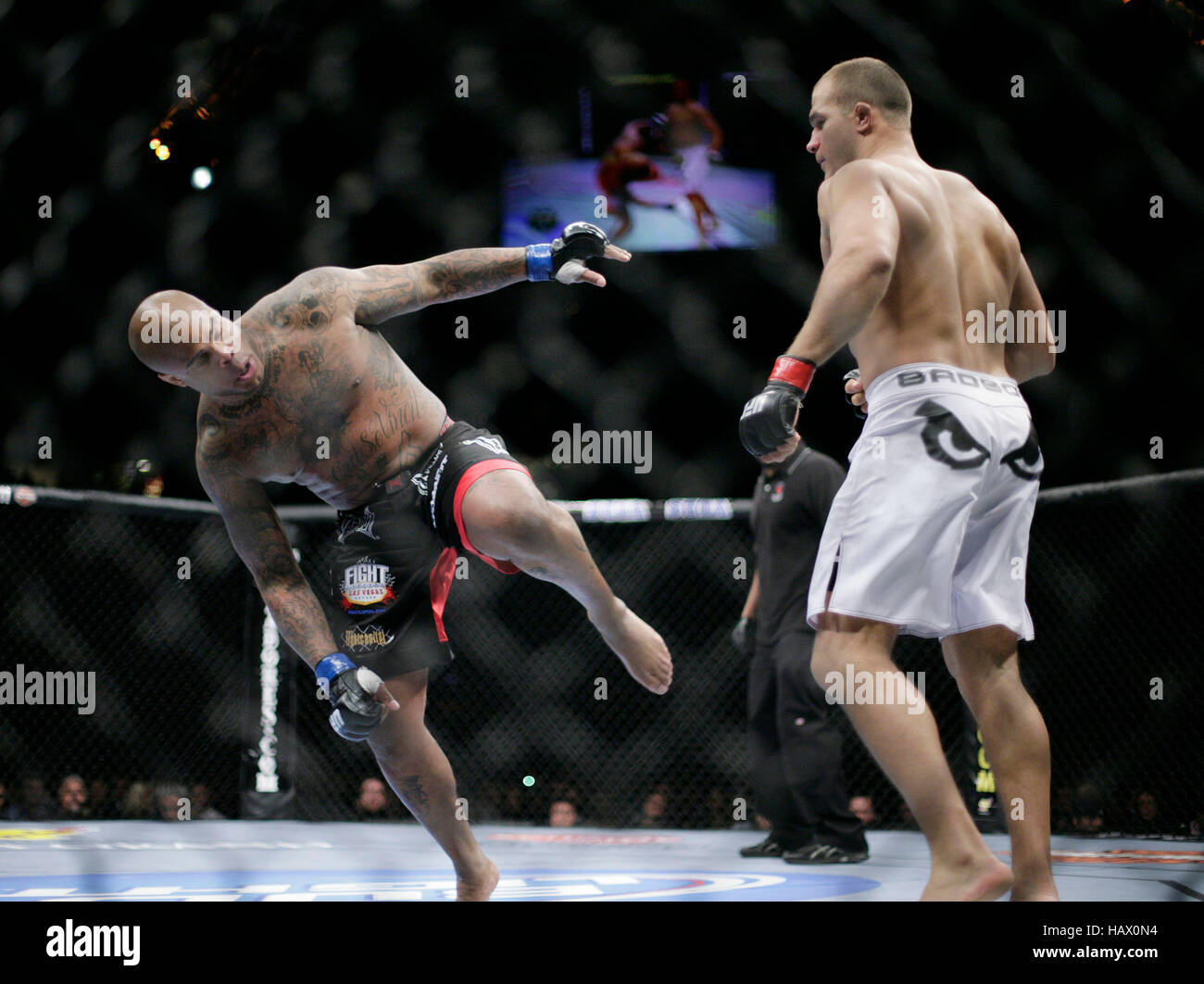 Junior dos Santos, right, fights Gilbert Yvel during UFC 108 at the MGM ...