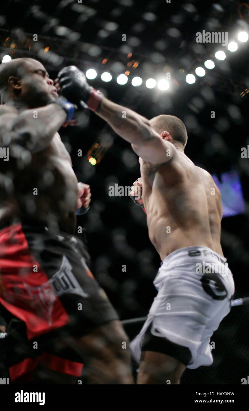 Junior dos Santos, right, fights Gilbert Yvel during UFC 108 at the MGM ...