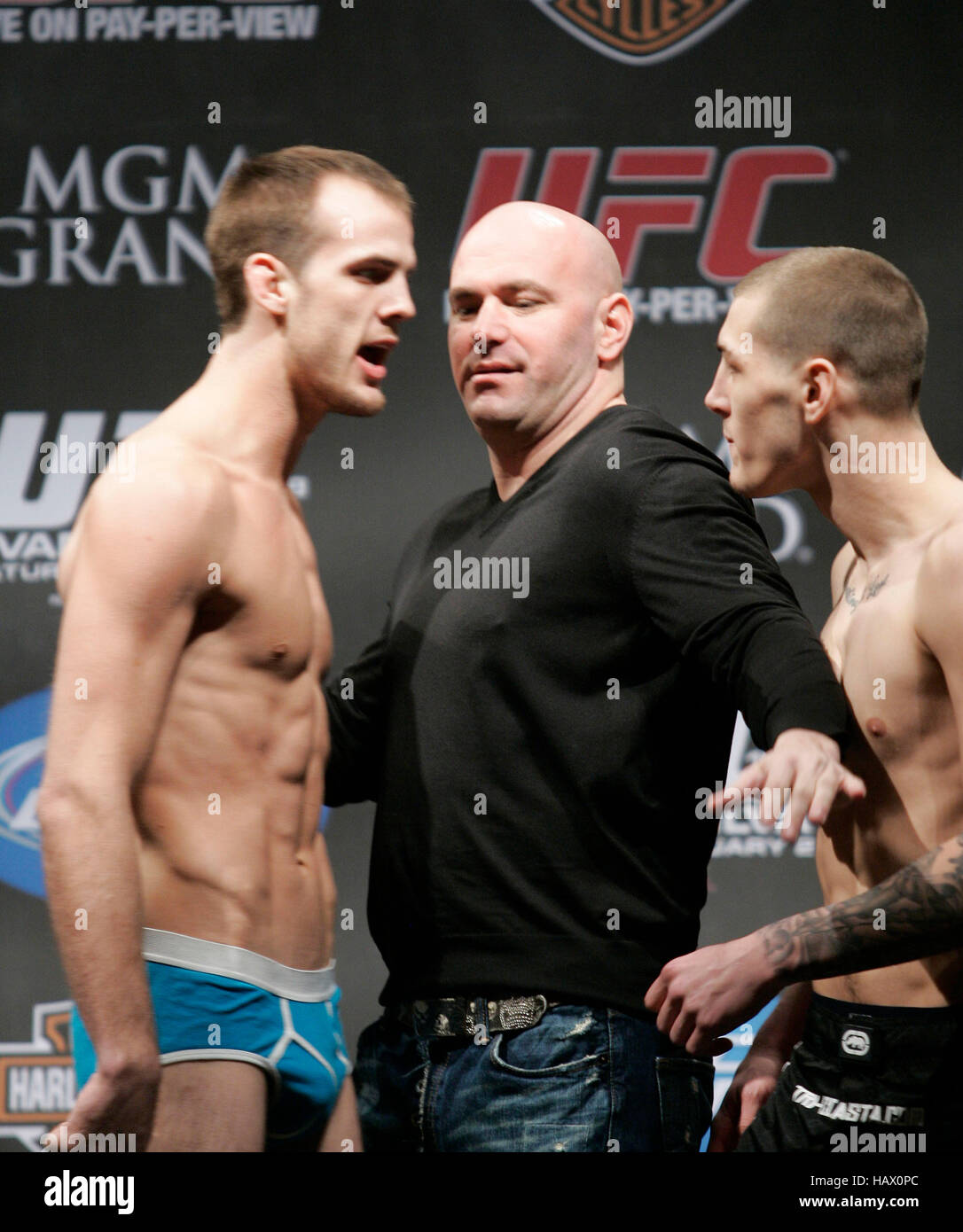 Cole Miller, left, and Dan Lauzon at the UFC 108 weigh-ins at the MGM ...