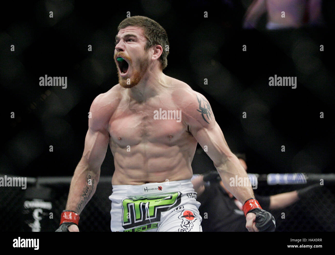 Jim Miller celebrates his victory over Duane Ludwig during UFC 108 at ...