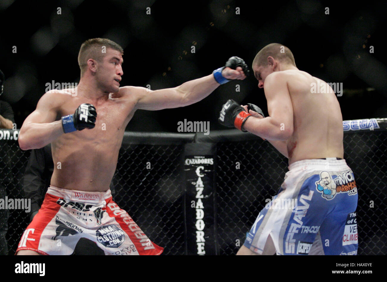 Sam Stout, left, fights Joe Lauzon during UFC 108 at the MGM Grand ...
