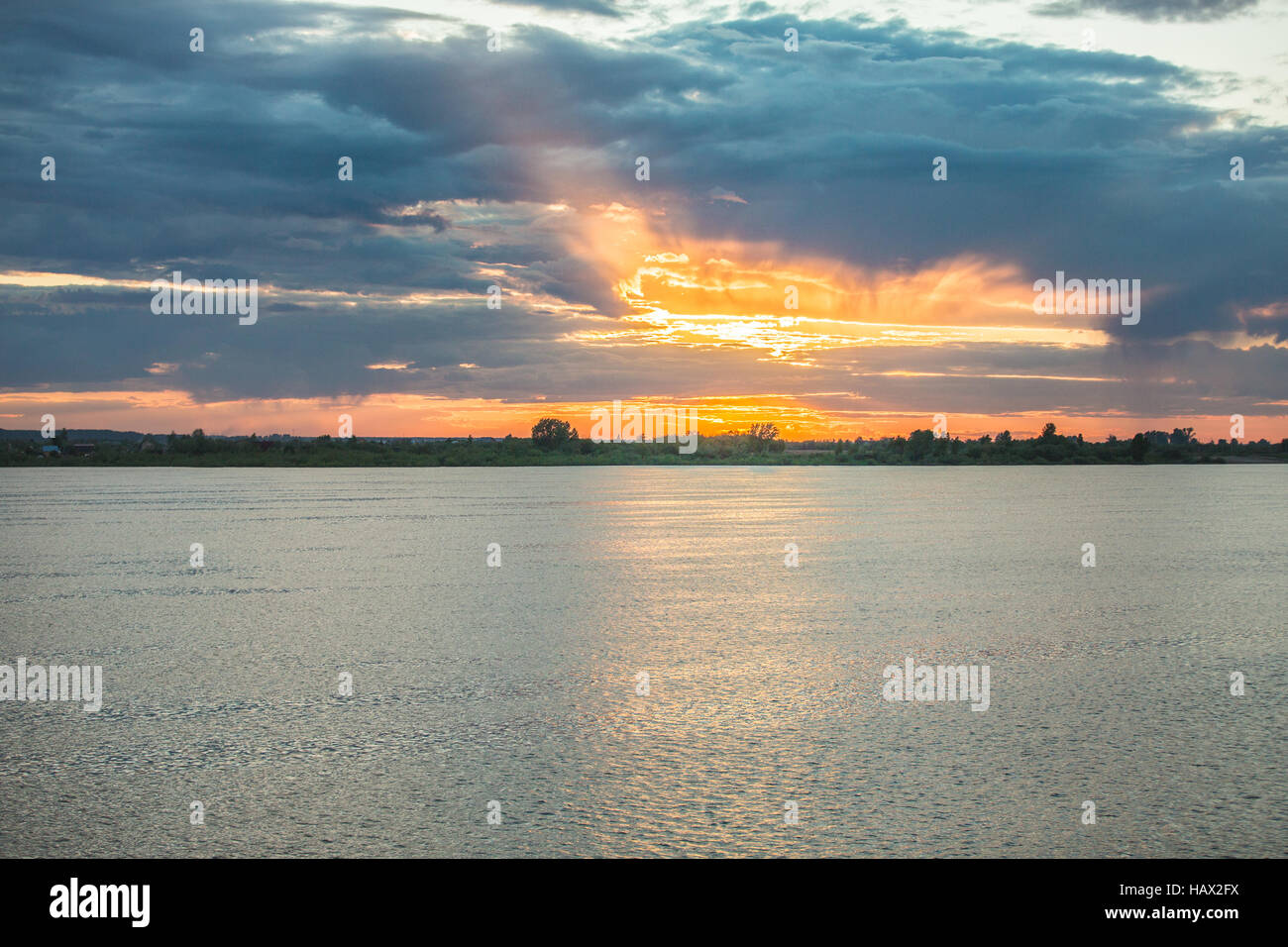 Sunset over river Tom Tomsk in summer Stock Photo - Alamy