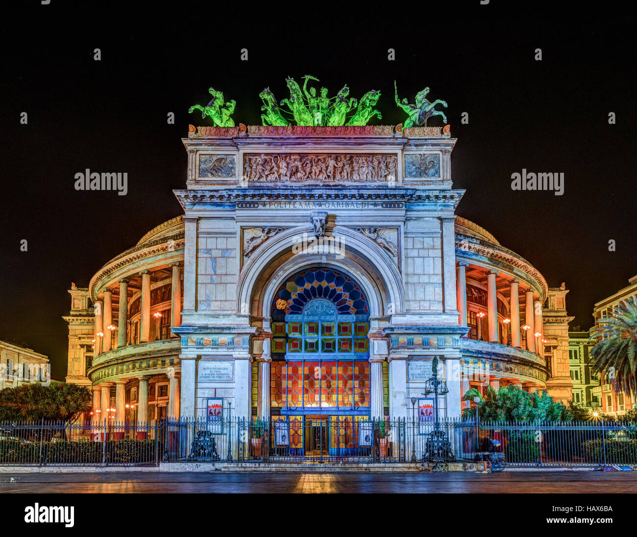Night view of the Politeama Garibaldi theater in Palermo Stock Photo ...