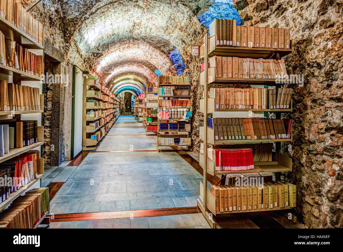 library setting with books and reading material Stock Photo - Alamy