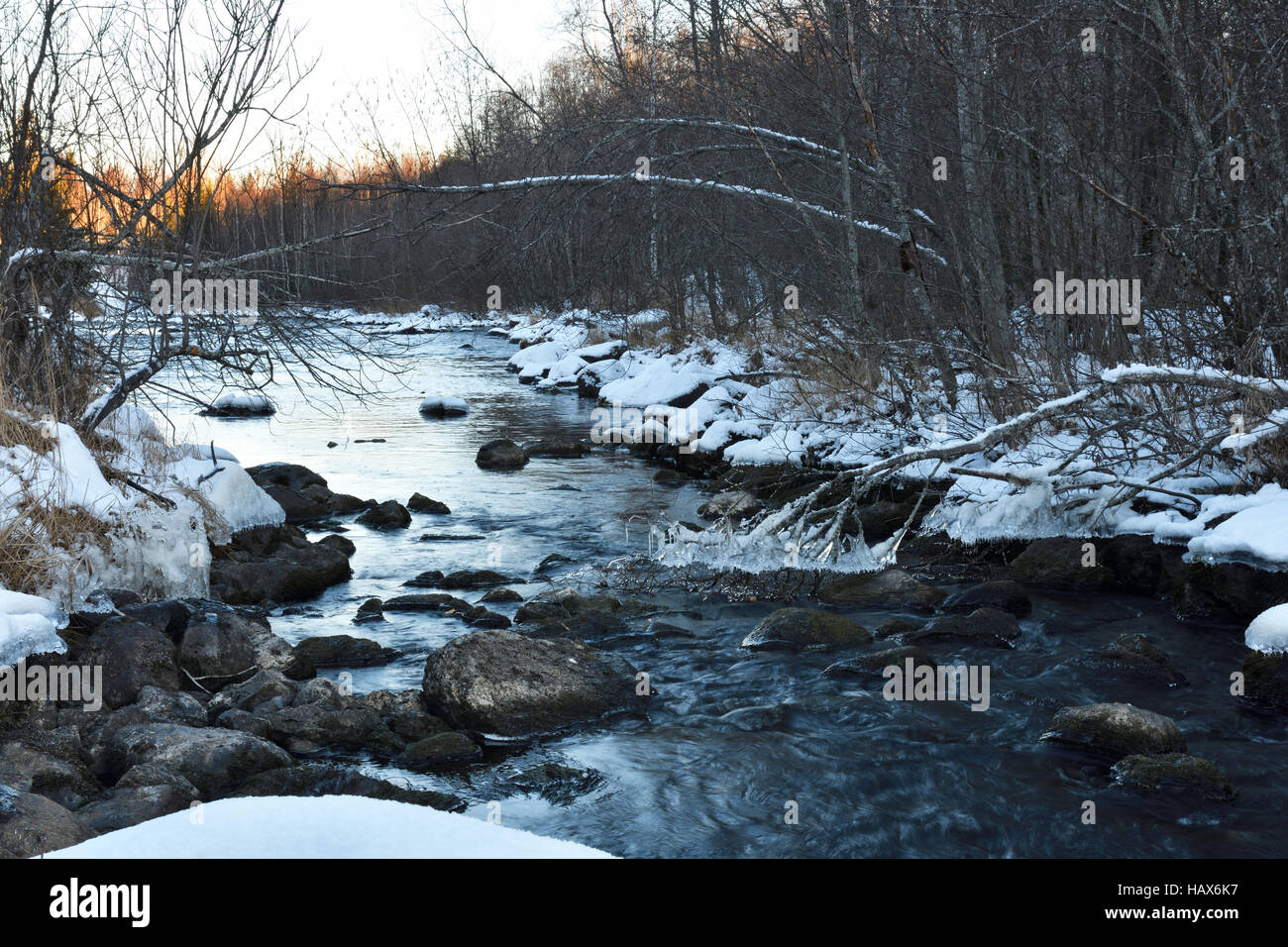 Little stream with snow and ice,picture from the North of Sweden Stock ...