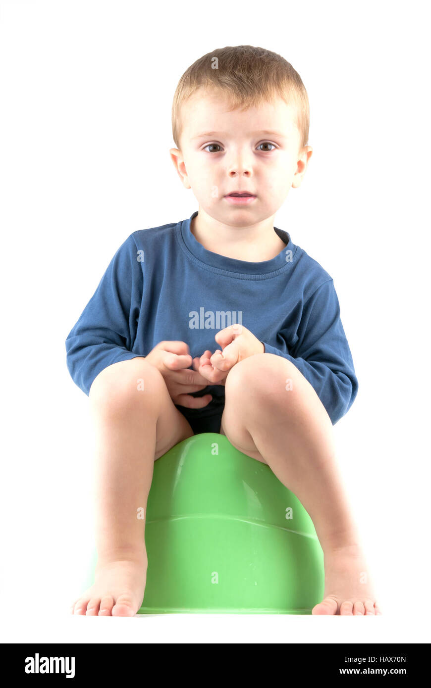 cute smiling child on a pot on a white background Stock Photo - Alamy