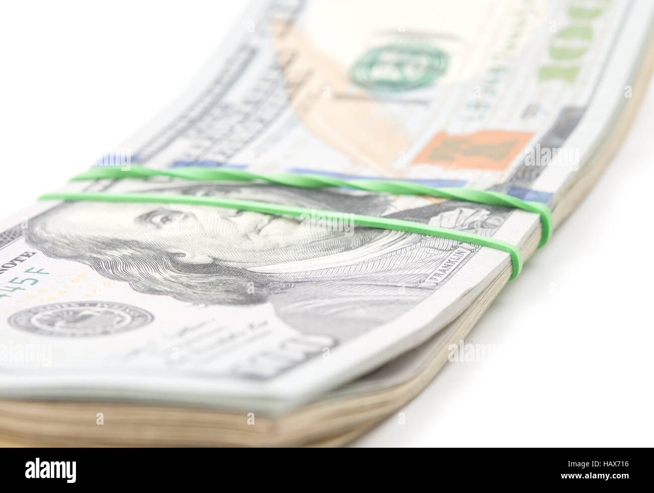 stack of hundred dollars isolated on white Stock Photo - Alamy