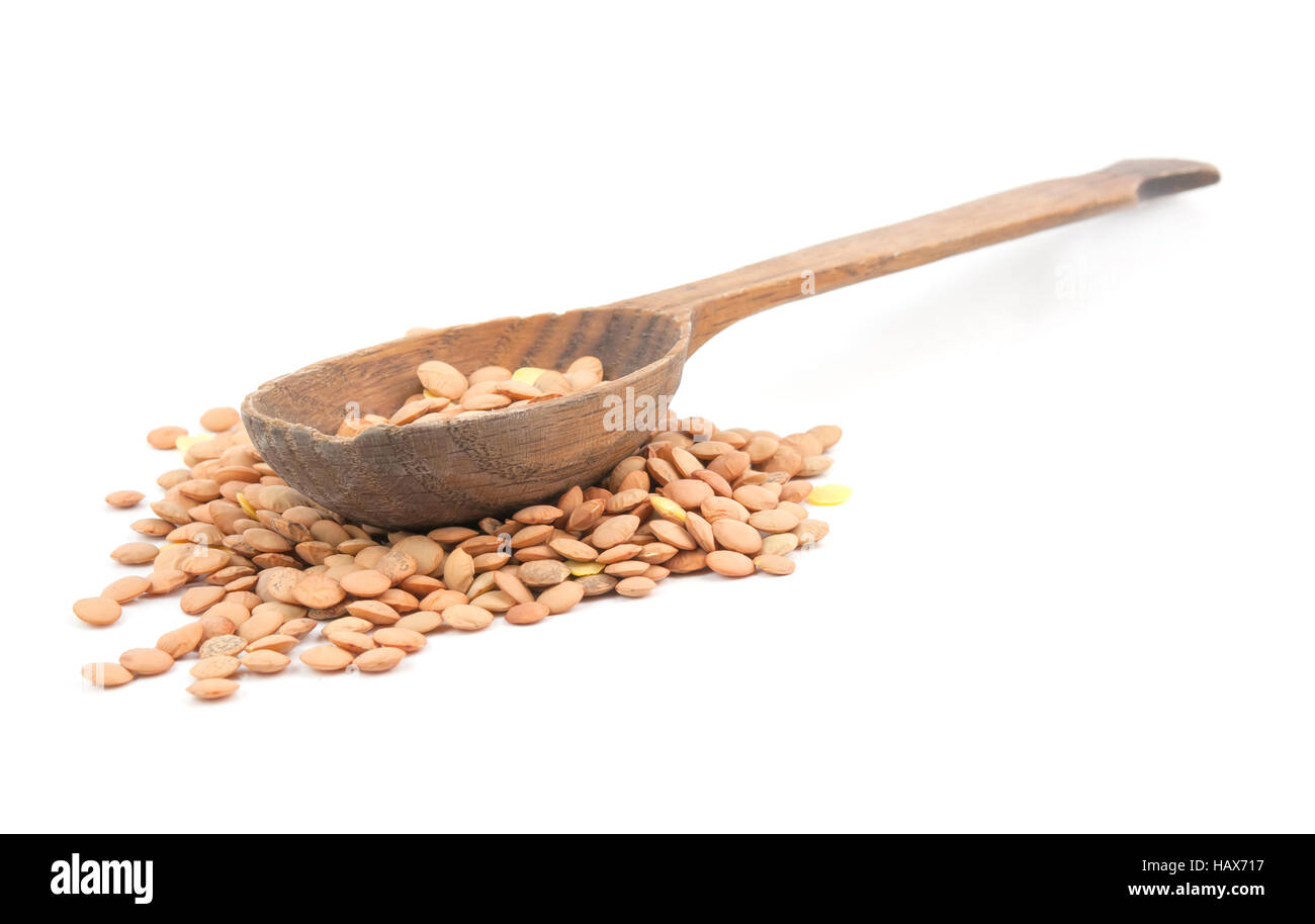 lentils wooden spoons isolated on a white Stock Photo - Alamy
