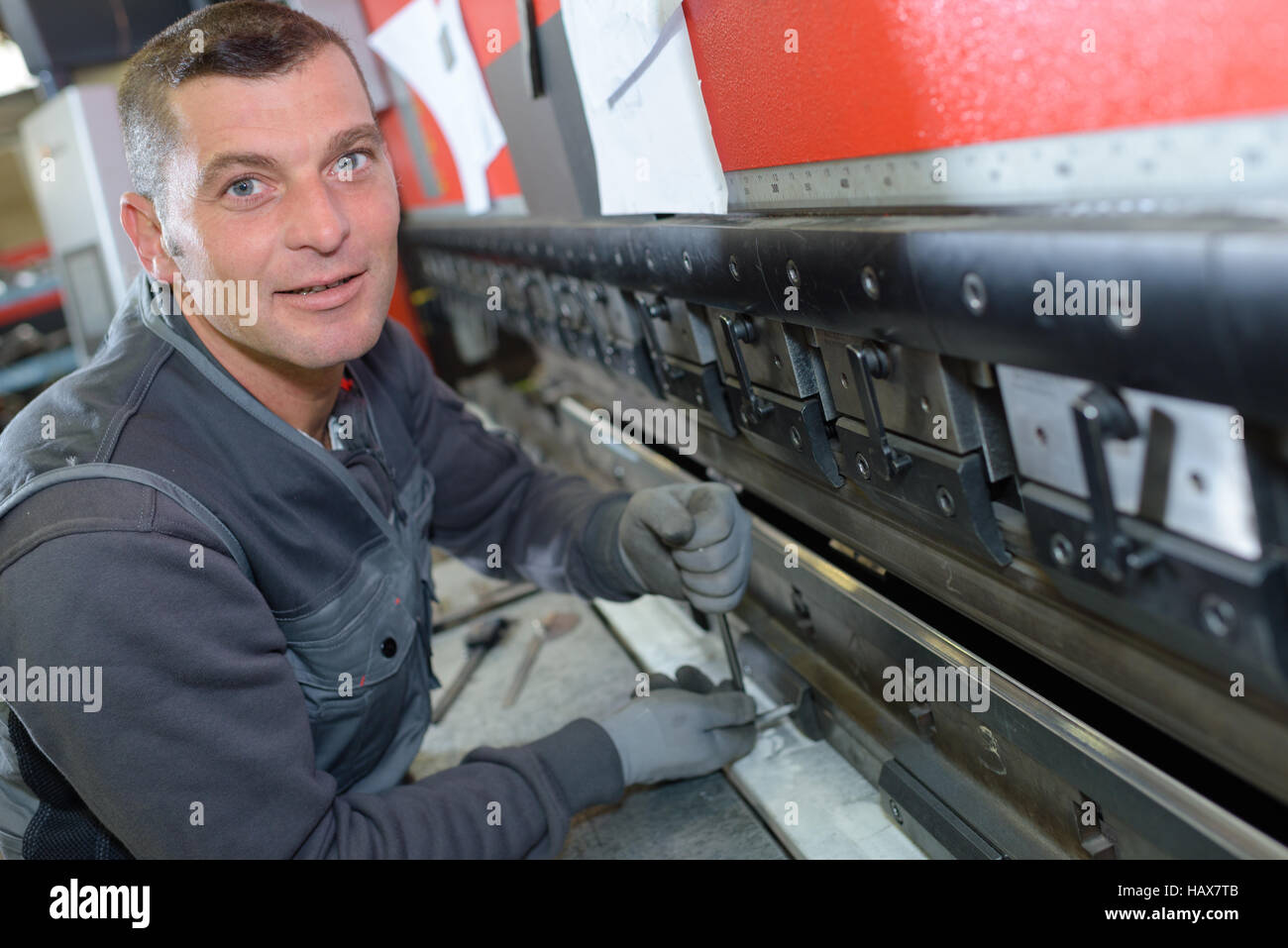 fixing a heavy machinery Stock Photo - Alamy