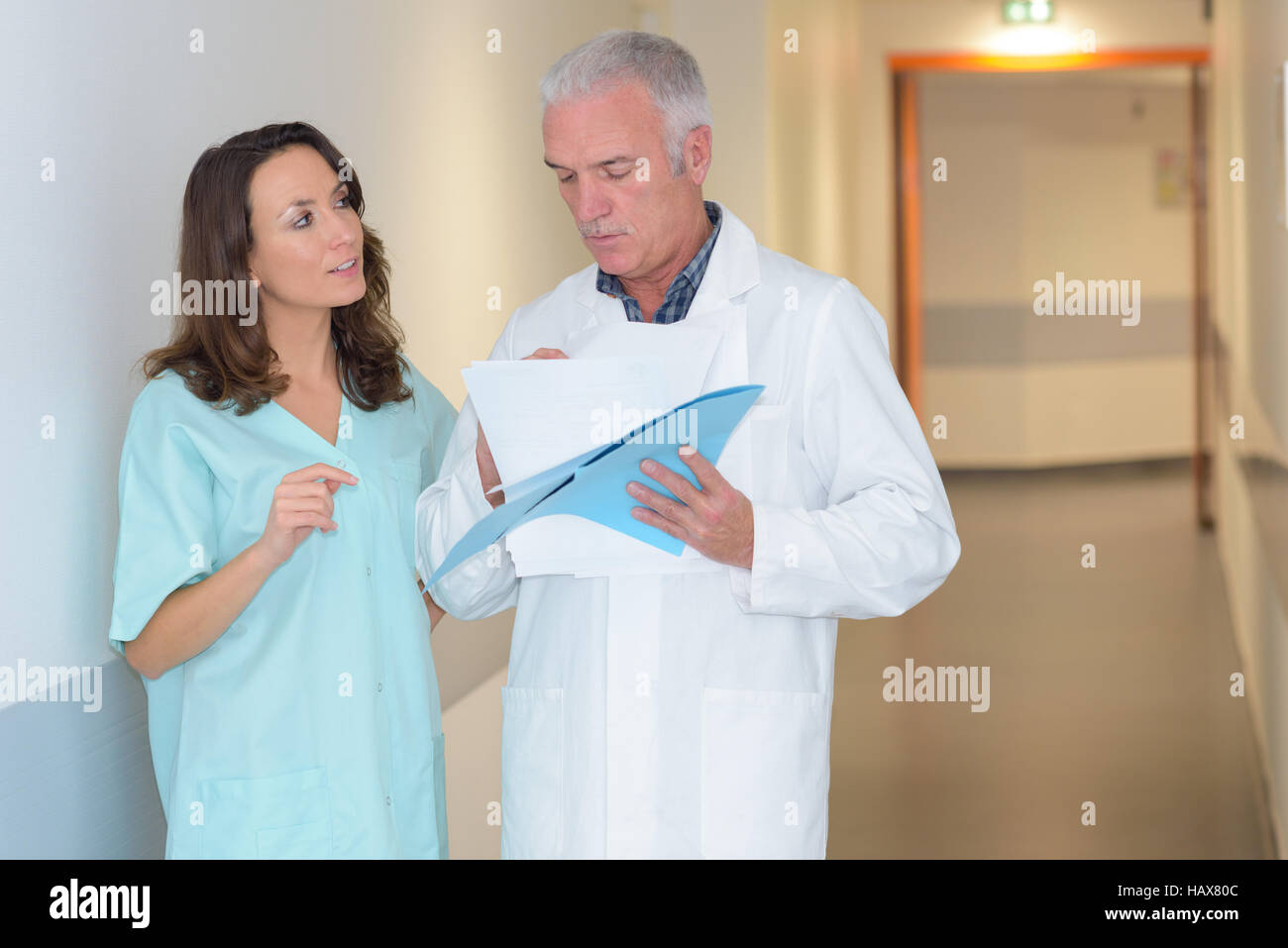 medical practitioner and assistant Stock Photo - Alamy