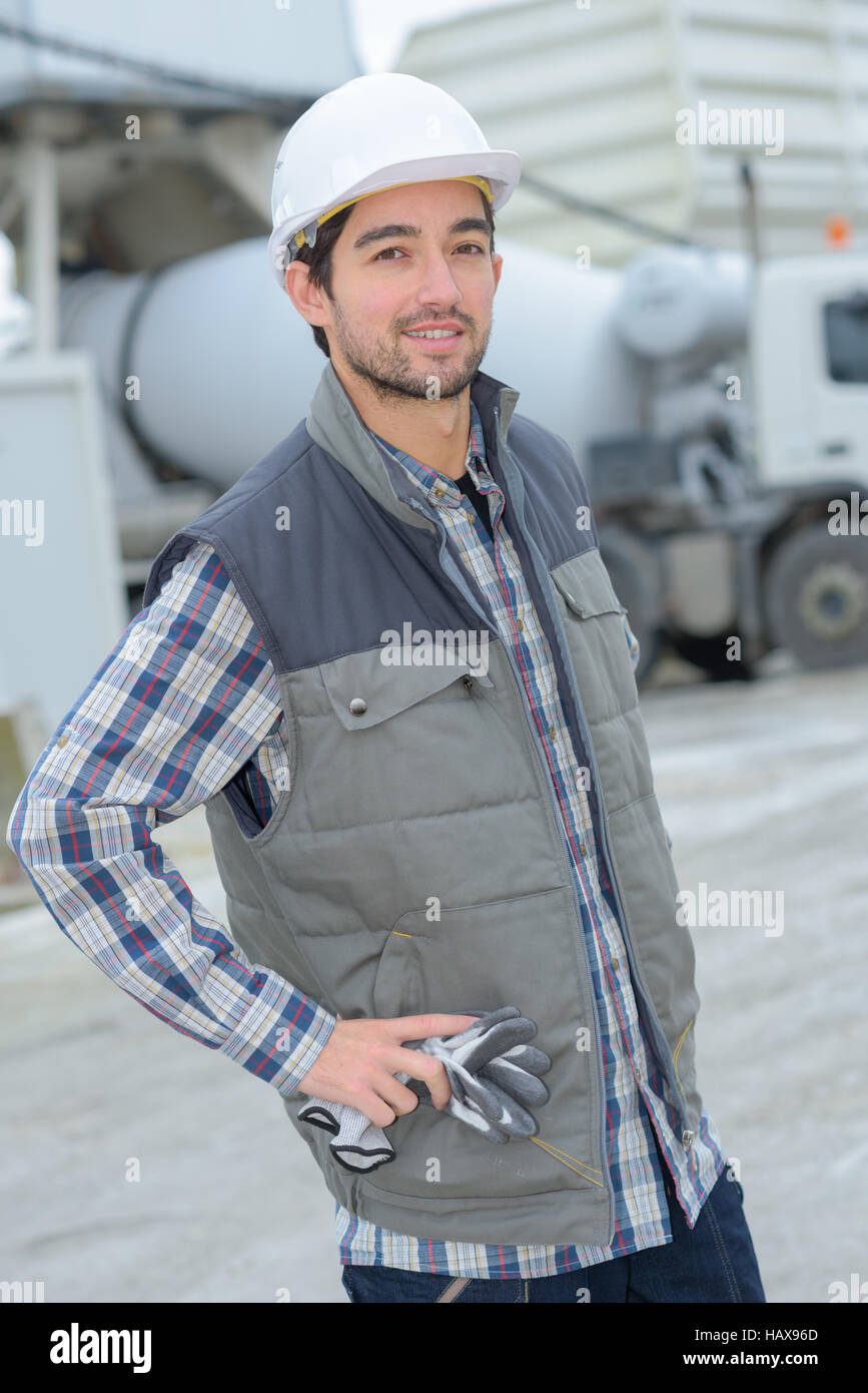Portrait of man on work site Stock Photo - Alamy