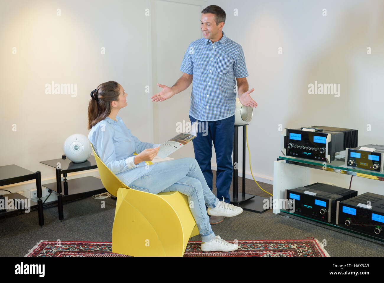 Couple in futuristic room Stock Photo - Alamy