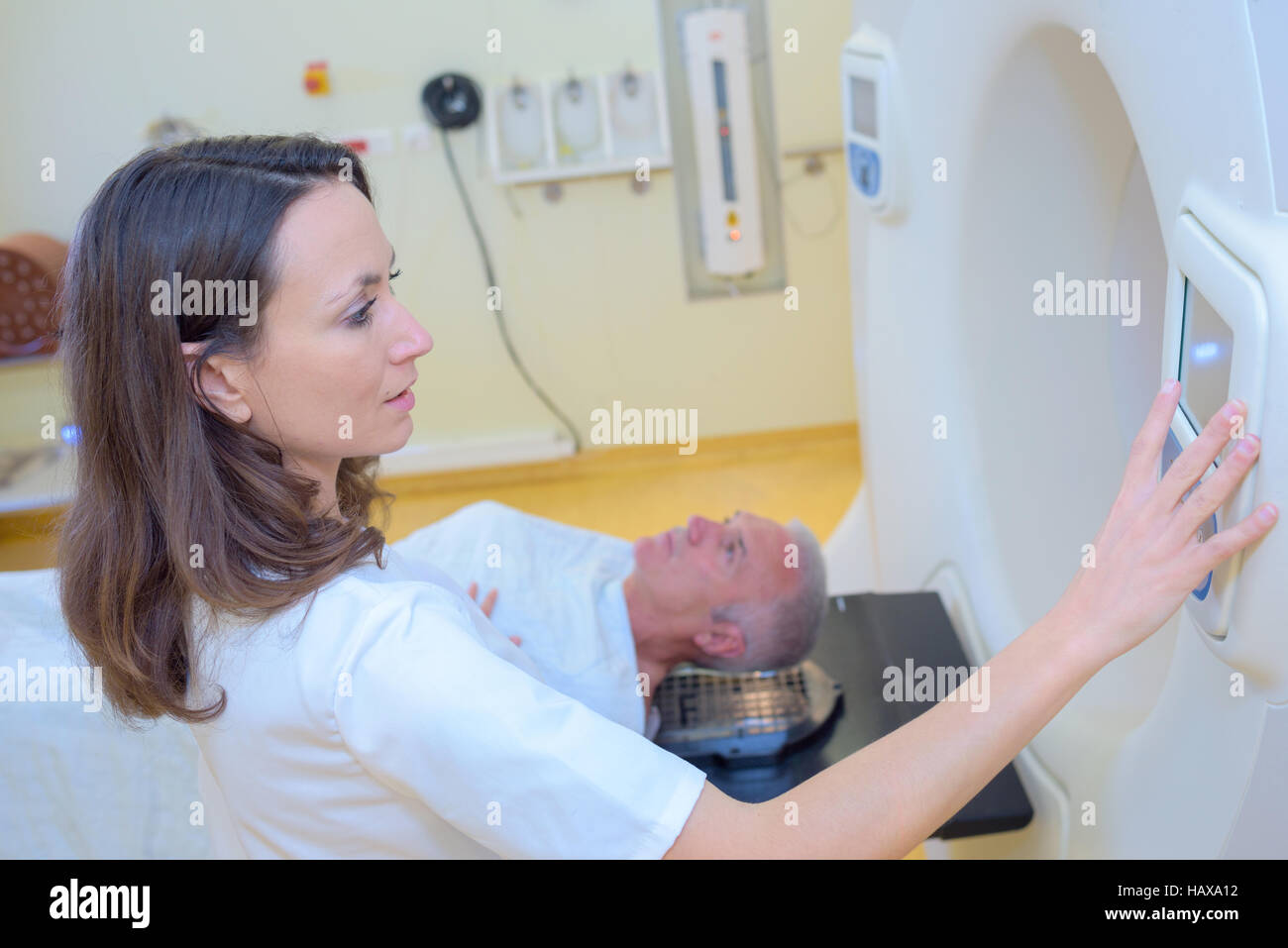 Nurse activating scanner Stock Photo - Alamy