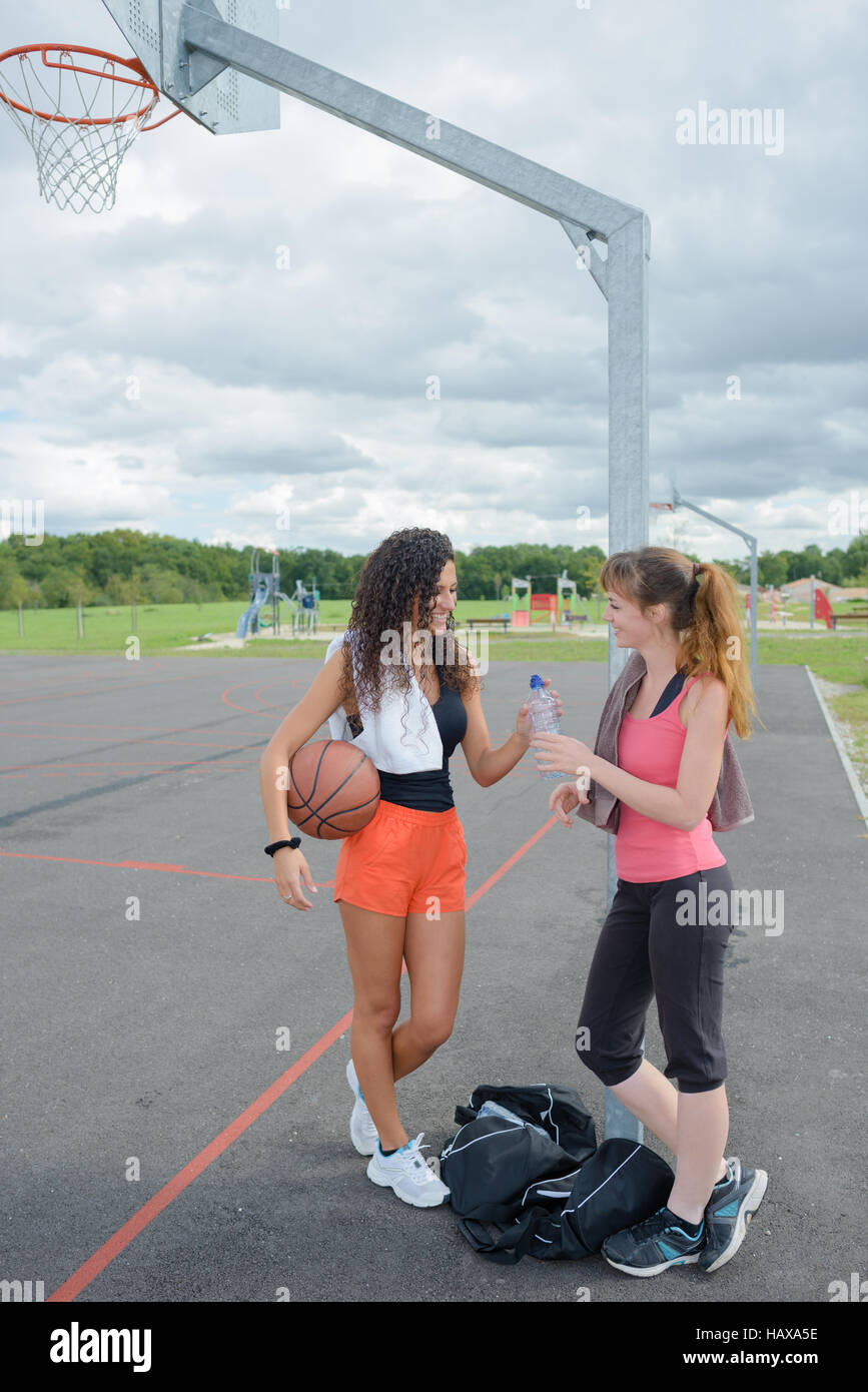 Women on basketball court Stock Photo - Alamy