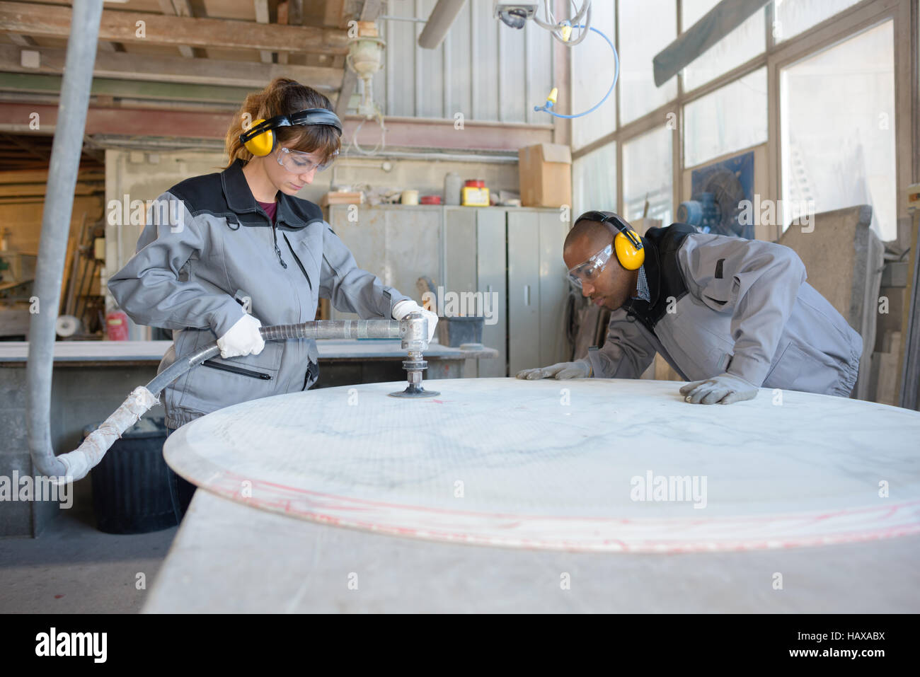 polishing the marble table Stock Photo - Alamy