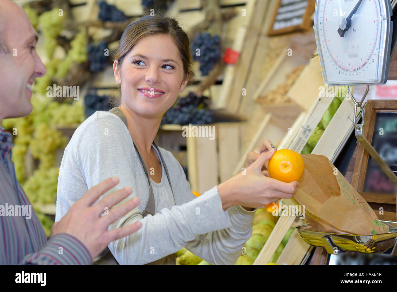 buying fresh orange Stock Photo - Alamy
