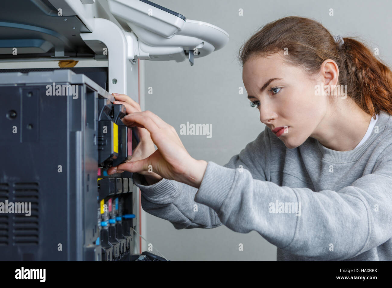 fixing the printer Stock Photo - Alamy
