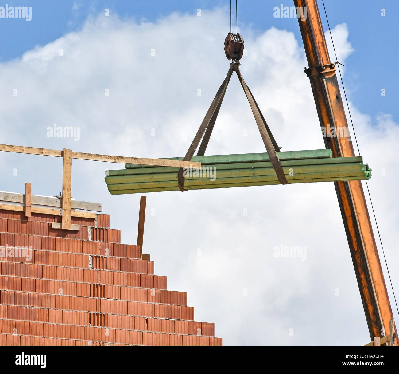Crane works at the construction site Stock Photo - Alamy