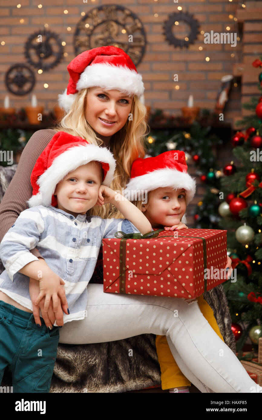 Family with presents in boxes Stock Photo - Alamy