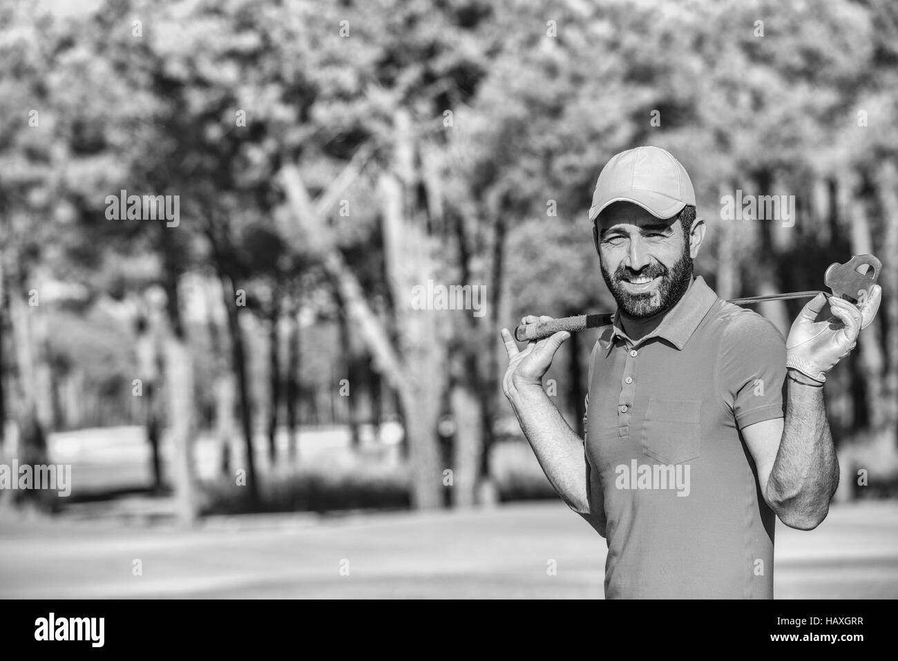 Young golfer black Black and White Stock Photos & Images - Alamy