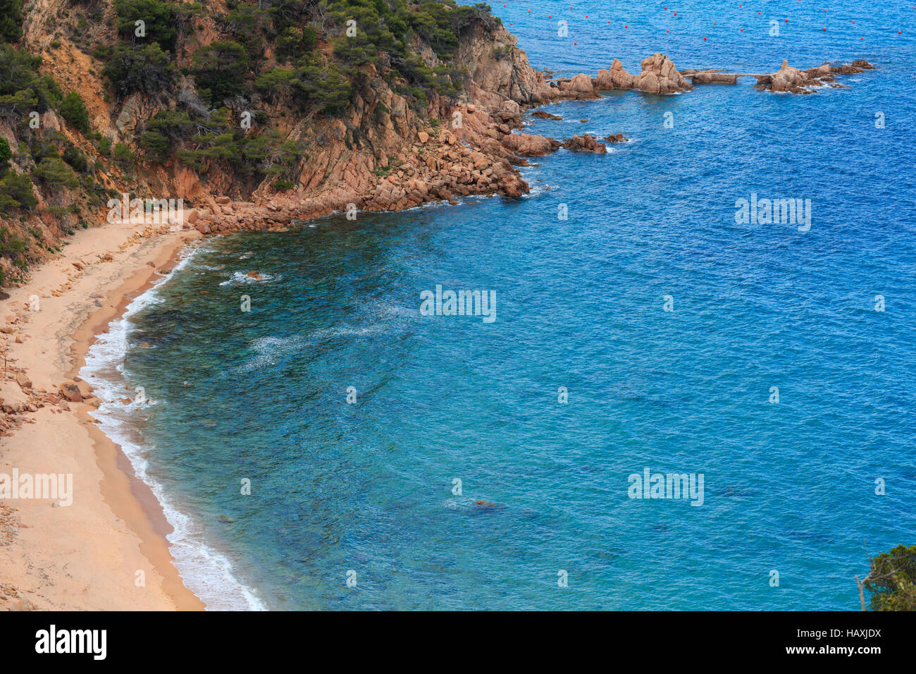 Summer sea rocky coast view with sandy Beach Cala del Senyor Ramon ...