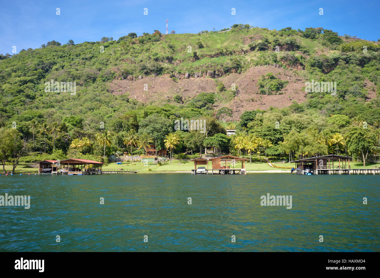 Beautiful coast and lush vegetation of the volcanic caldera Lake ...
