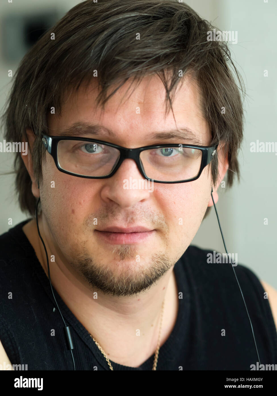 Young cool trendy breaded caucasian man with glasses. Real people Stock ...