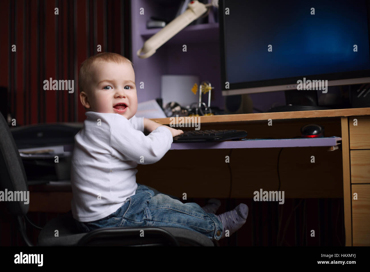 little boy using computer Stock Photo - Alamy