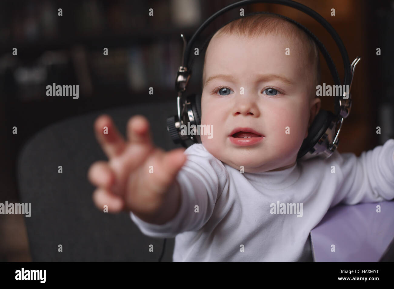 little boy using headphones with mic Stock Photo - Alamy
