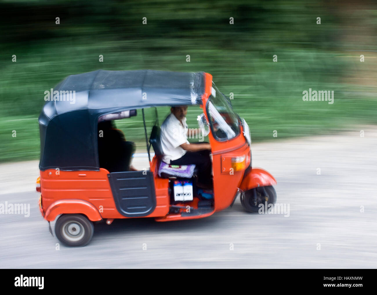 Speeding tuk tuk hi-res stock photography and images - Alamy