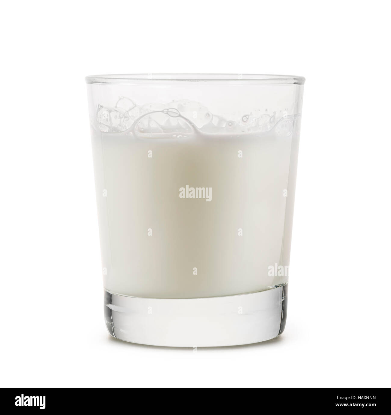 glass cup full of milk on white background Stock Photo - Alamy