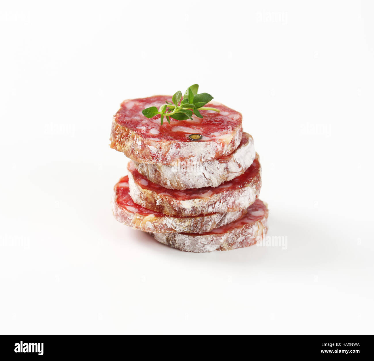 Slices of French dry cured sausage Stock Photo - Alamy