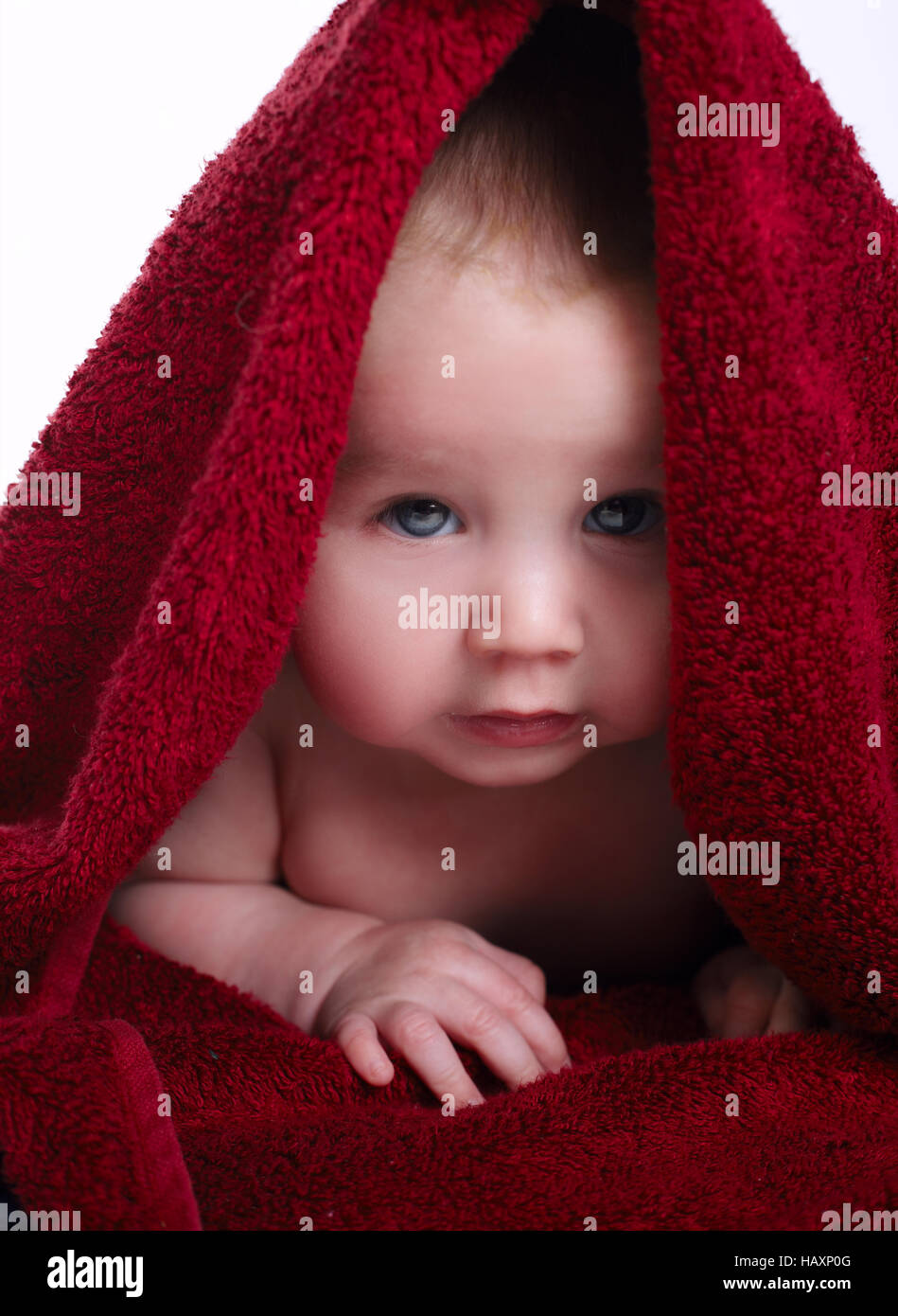 cute baby with red towel Stock Photo - Alamy