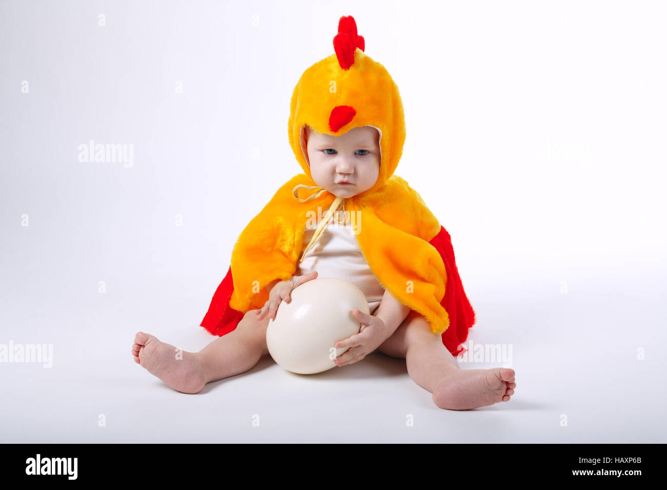 little funny boy in chicken costume Stock Photo - Alamy