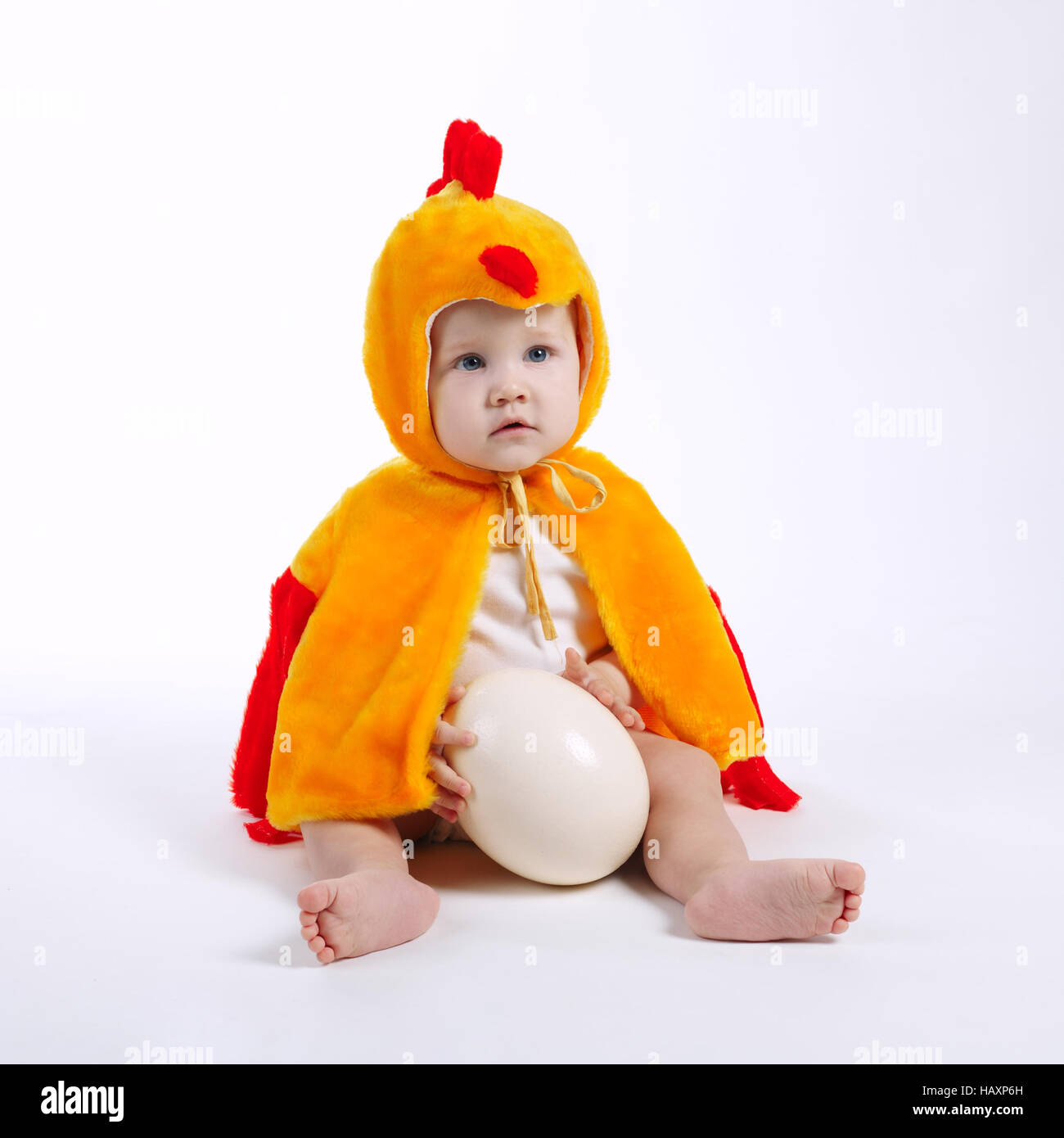 little funny boy in chicken costume Stock Photo - Alamy