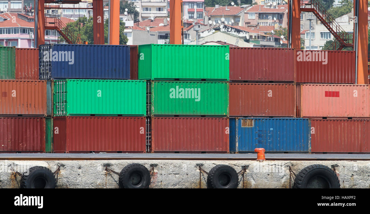 Containers waiting to transfer in a port Stock Photo - Alamy