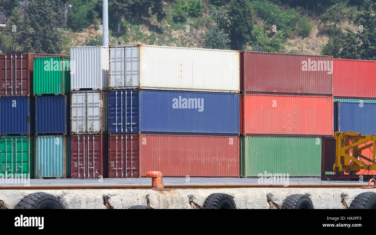 Containers waiting to transfer in a port Stock Photo - Alamy