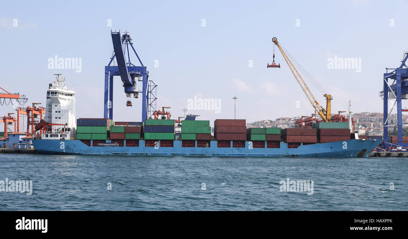Container Ship is loading in a port Stock Photo - Alamy