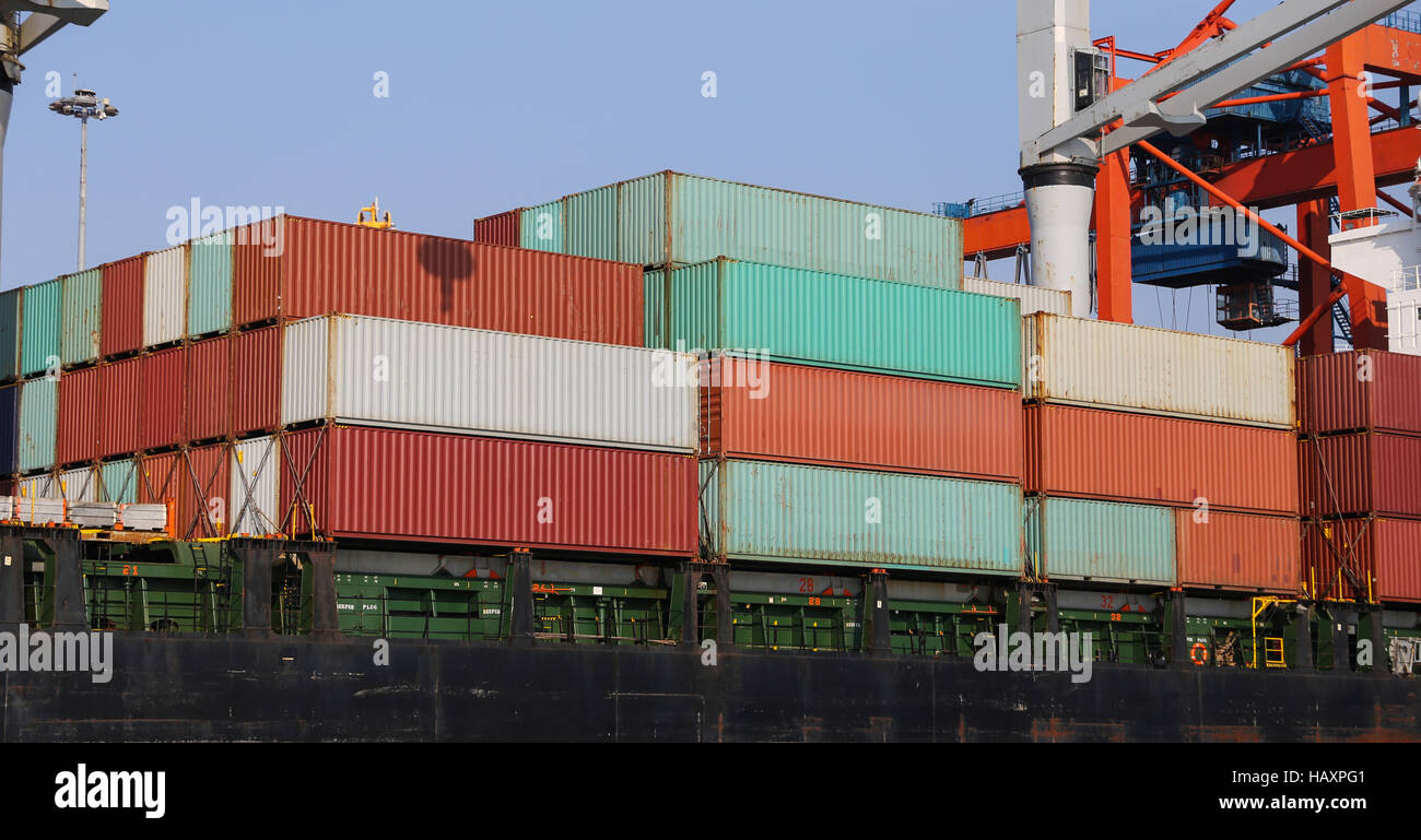 Container Ship is loading in a port Stock Photo - Alamy