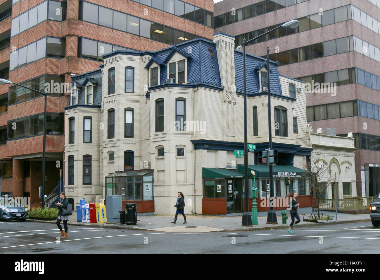 Old row houses are surrounded by modern office buildings at 20th and N ...