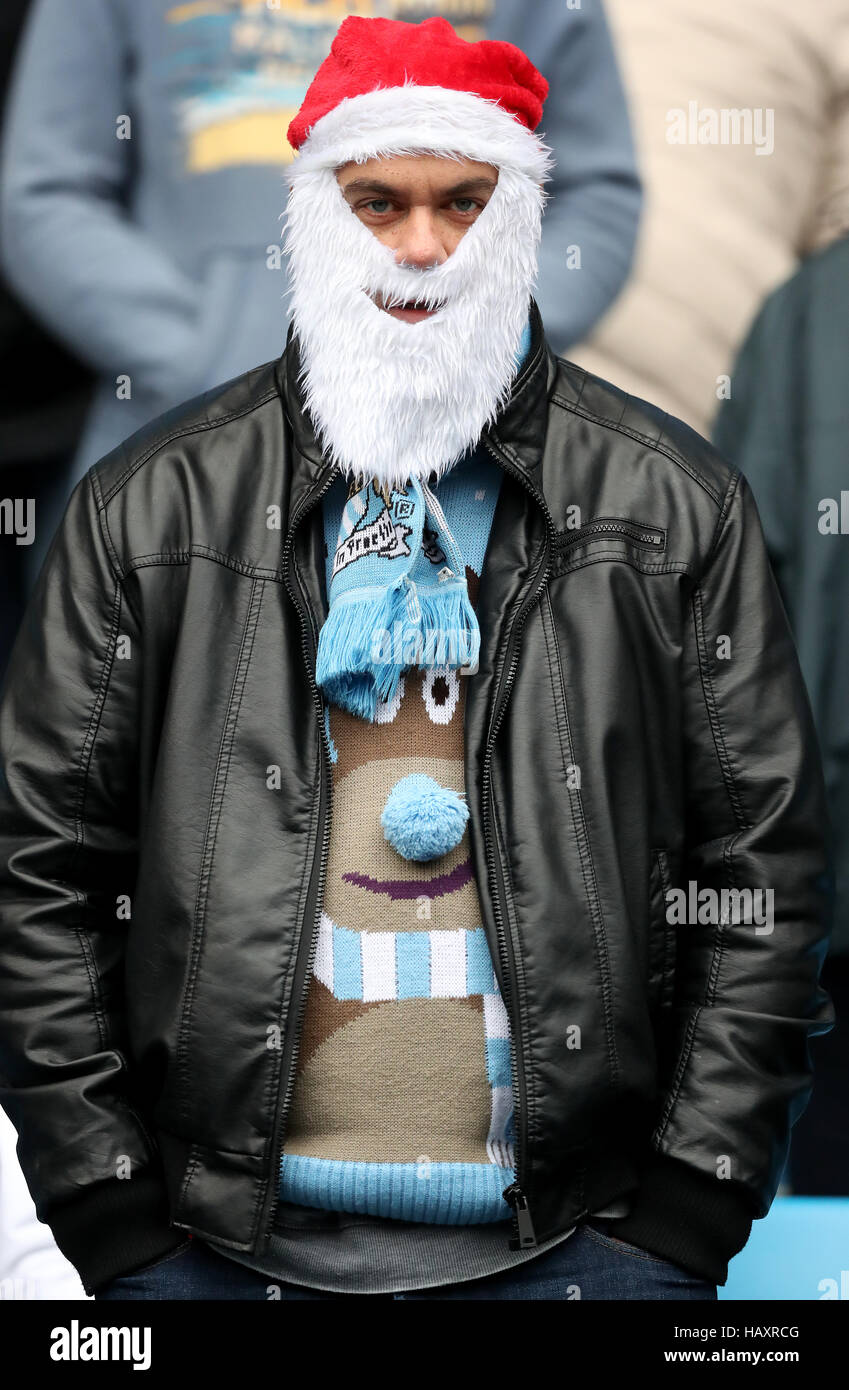 A Manchester City fan dressed as Santa Claus in the stands during the ...