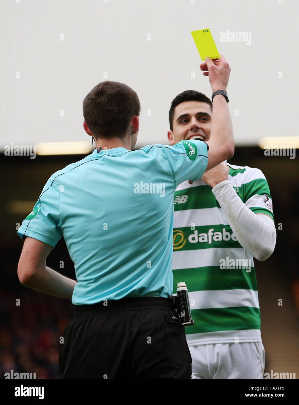 Celtic's Tom Rogic is shown a yellow card for his celebrations after ...